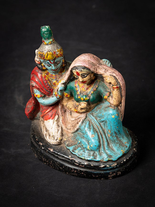 Antique terracotta Radha and Krishna statue from India