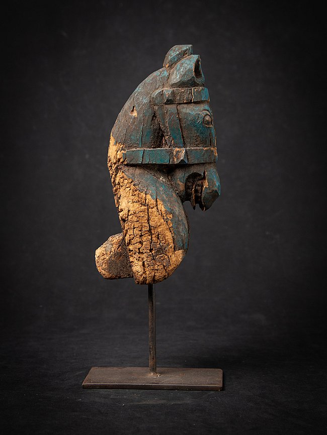 Antique wooden temple fragment of a Horse head from India