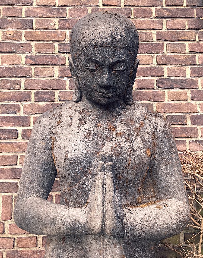 Large lavastone Monk statue from Indonesia