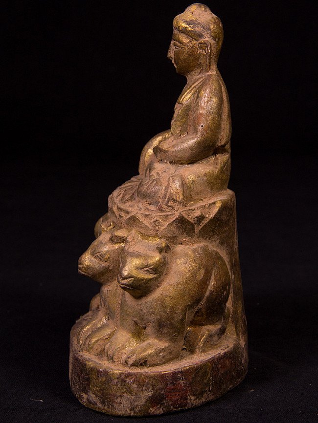 Old wooden Buddha statue from Burma