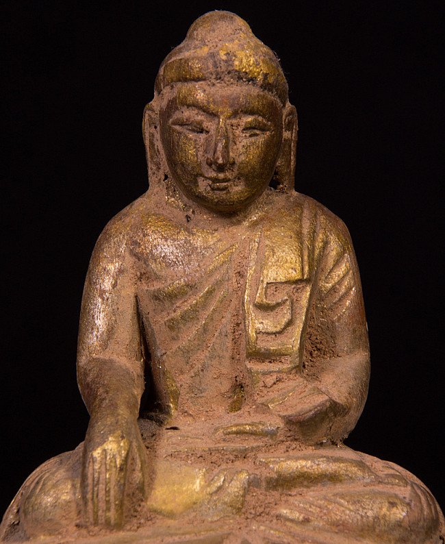 Old wooden Buddha statue from Burma