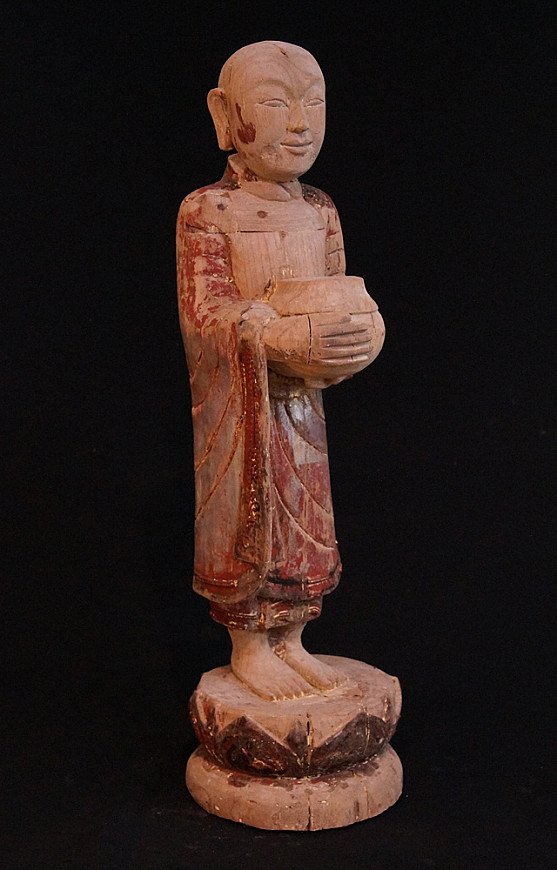 Old standing monk statue from Burma (Myanmar)
